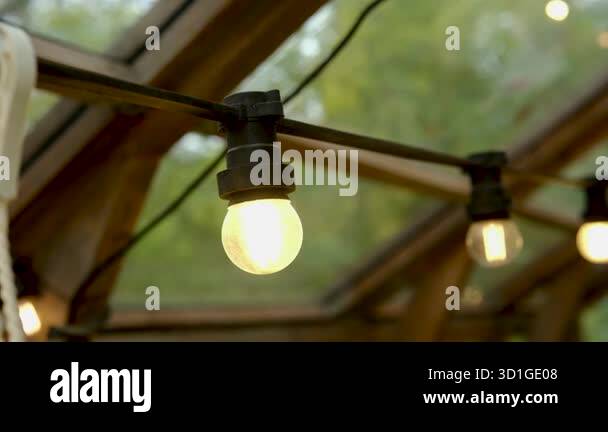 Outdoor string lights glowing inside Stock Videos & Footage - HD and 4K ...