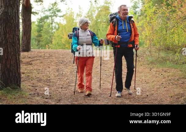 Hiking tourism adventure. Senior couple man woman enjoying outdoor ...