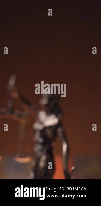 vertical video of bronze law statue represented by blindfolded goddess ...