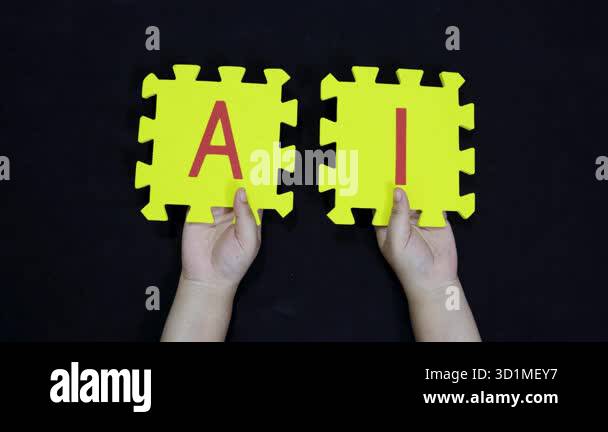 artificial intelligence concept hands displaying foam alphabet tiles ...