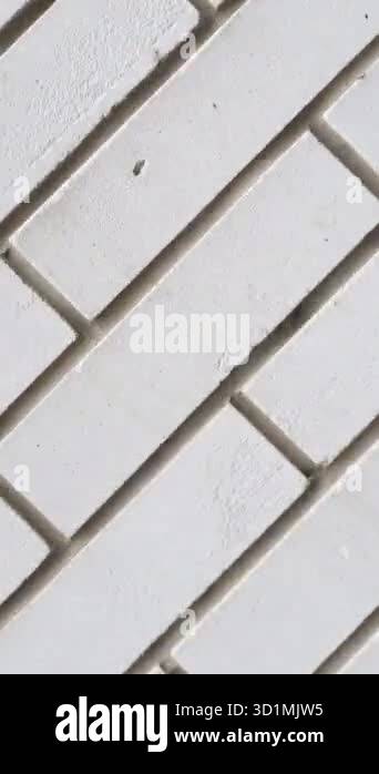 White diagonal brick wall with horizontal masonry lines. Stop motion ...