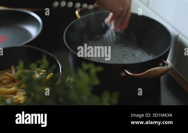 Boiling Penne Pasta in the Pot Stock Video Footage - Alamy