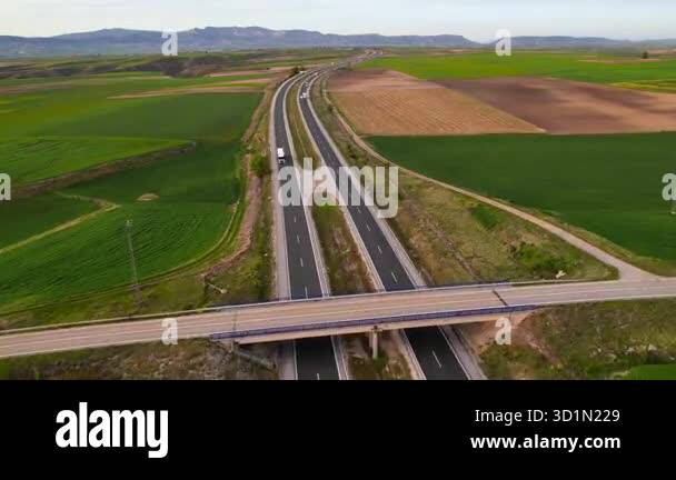 Aerial hyperlapse over a rural highway captured by drone, showing ...