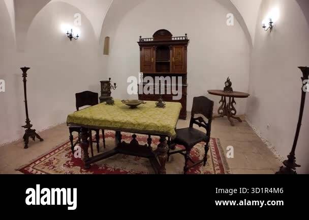 Transylvania, Romania - Aug 8, 2025:Corvin Castle royal room with table ...