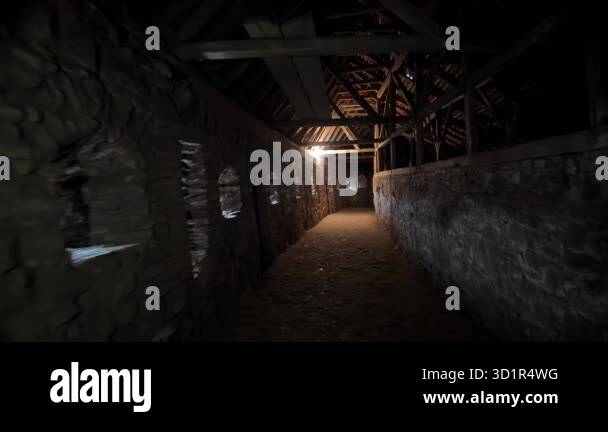 Prejmer Fortified Church interior corridor with stone walls, wooden ...