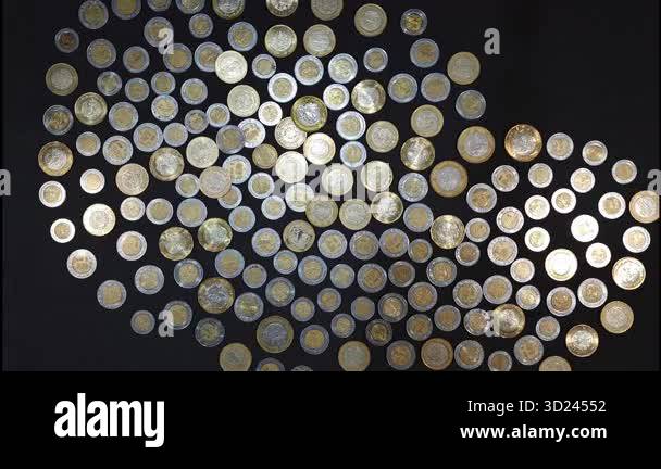 Stop motion: Mexican peso coins forming the silhouette of the map of ...