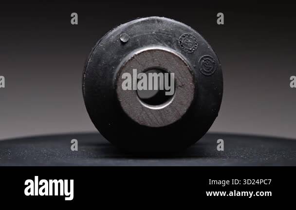 Video of a rotating bushing on a gradient background. A rubber and ...