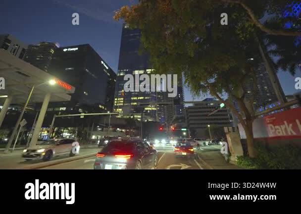 Car point of view driving in downtown Miami, Florida at night ...