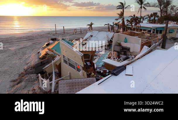 Natural disaster and its consequences. Hurricane destroyed house roof ...