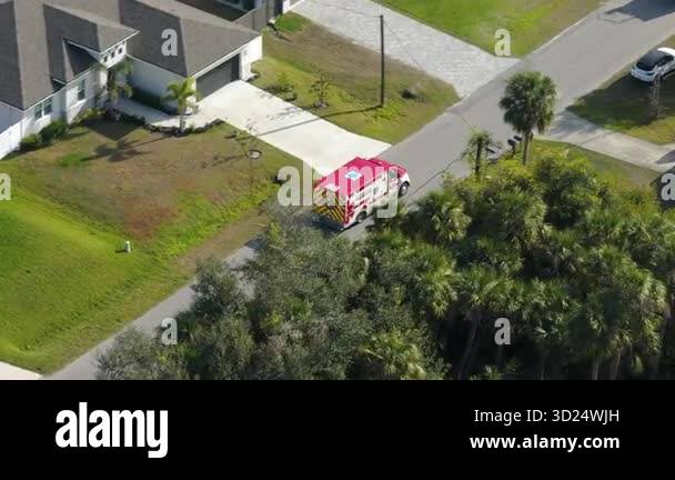 Aerial view of fire department emergency response vehicle traveling in ...