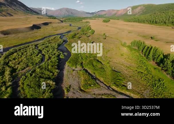 Meandering stream river against backdrop Stock Videos & Footage - HD ...
