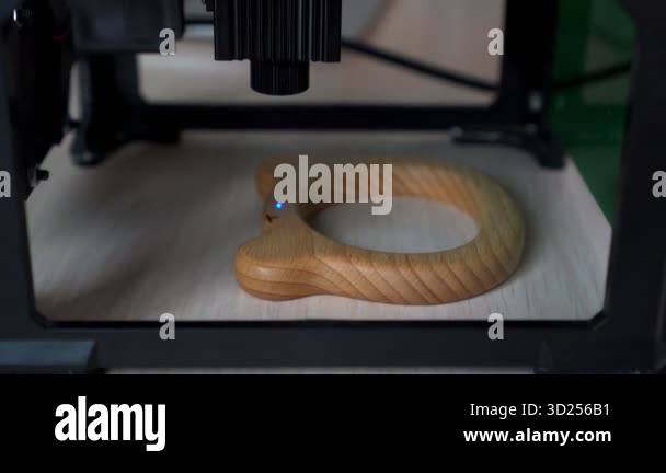 Desktop laser wood burning machine uses a blue laser beam to inscribe ...