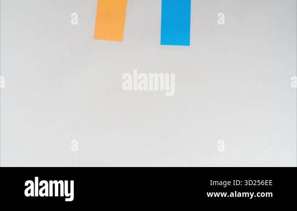 Heap of different colorful transparent self-adhesive sticky paper notes ...