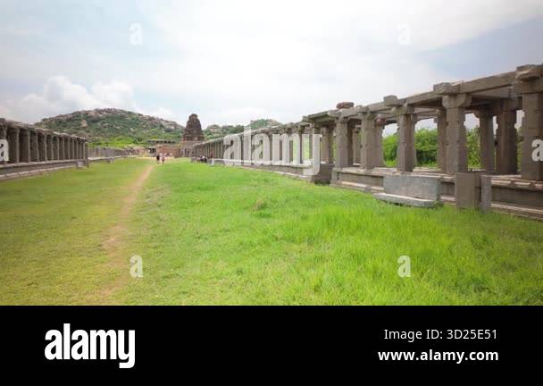 The back side of the Vijaya Vittala Temple in Hampi, Karnataka is full ...