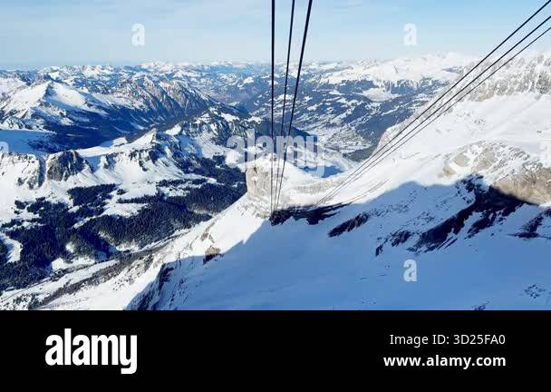 Glacier 3000, Switzerland: 15 February 2025: Glacier 3000 cable car ...