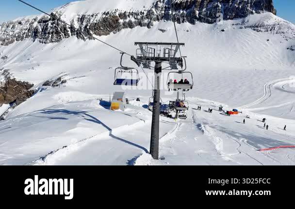 Glacier 3000, Switzerland - 15 February 2025: Scenic ski lift ride with ...
