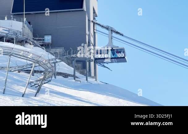 Glacier 3000, Switzerland - 15 February 2025: Cable car ascending to ...