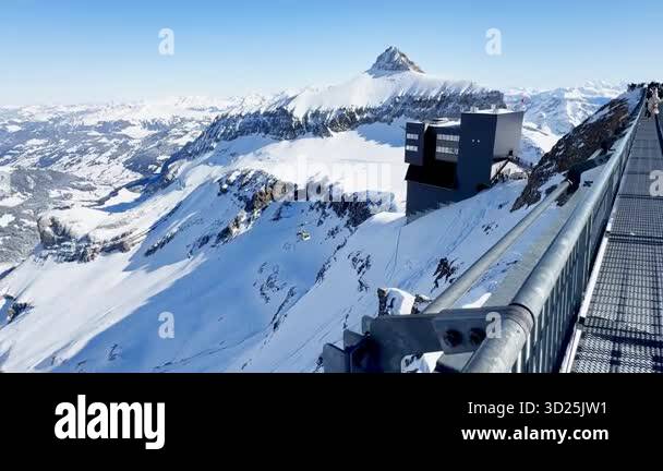 Glacier 3000, Switzerland - 15 February 2025: Scenic ski lift ride with ...