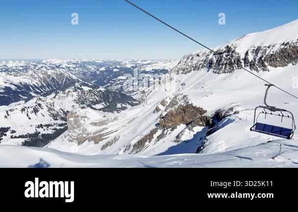 Glacier 3000, Switzerland - 15 February 2025: Scenic ski lift ride with ...