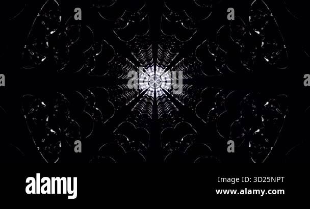 This seamless looping tunnel video displays an intricate design with ...