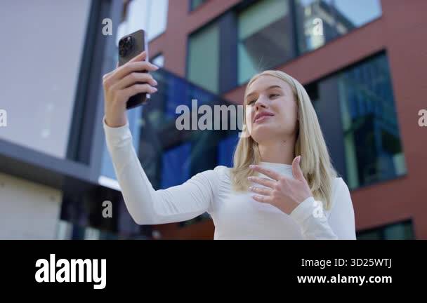 Woman in white top holding Stock Videos & Footage - HD and 4K Video ...