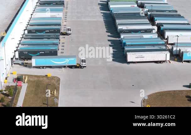Amazon warehouse yard with many parked trailers and trailers ...
