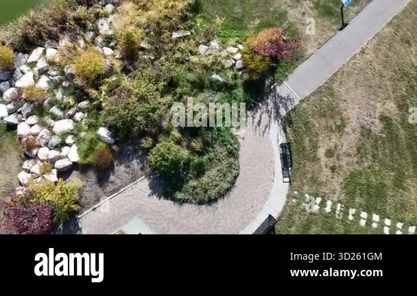 Aerial video of Stonebridge Saskatoon in fall showing colorful trees ...