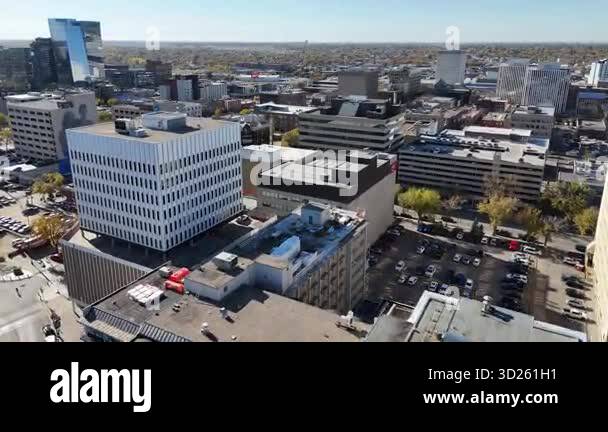 Aerial video of Downtown Saskatoon in fall showing colorful trees ...