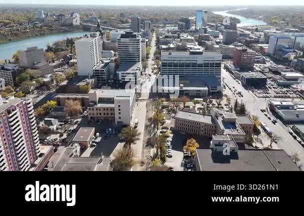 Aerial video of Downtown Saskatoon in fall showing colorful trees ...