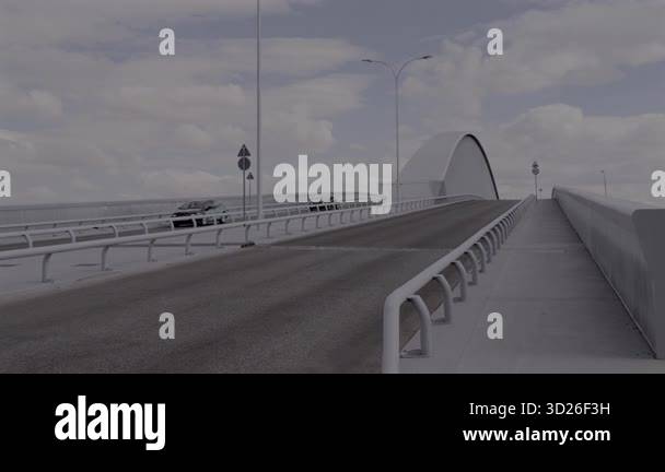 Modern architecture of a highway bridge featuring a prominent arch ...