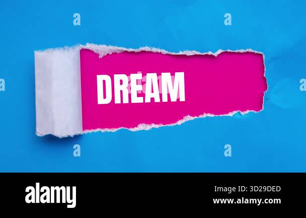 Dream Big message written on ripped torn paper background. Conceptual ...