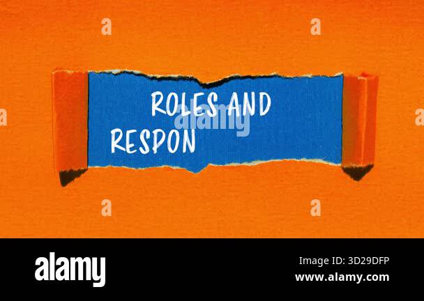 Roles and responsibilities message writing on ripped torn paper ...