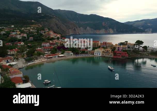 Aerial drone view of scenic Asos fishing town, tourist location at ...