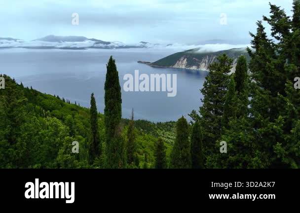 Aerial drone view of Ithaca Greek landscape, foggy conditions and ...