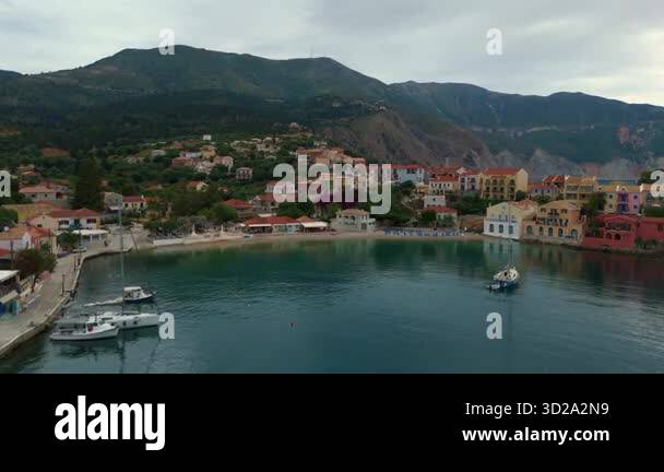 Aerial drone view of scenic Asos fishing town, tourist location at ...