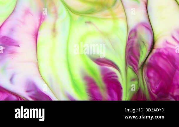 This stock video features an extreme close-up shot of a thick mixture ...