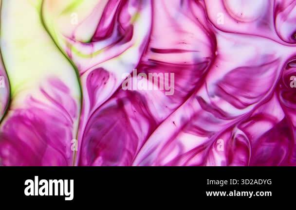 This stock video features an extreme close-up shot of a thick mixture ...