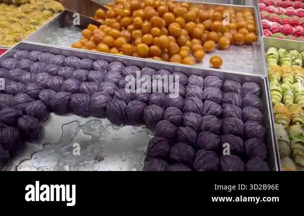 The camera moves along a market stall displaying traditional Turkish ...