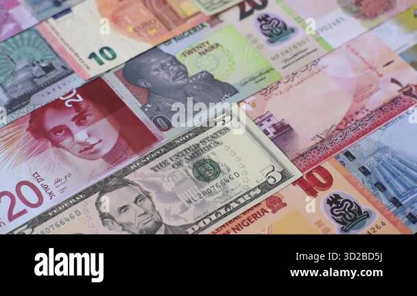 Paper money, banknotes of different countries as a business background ...