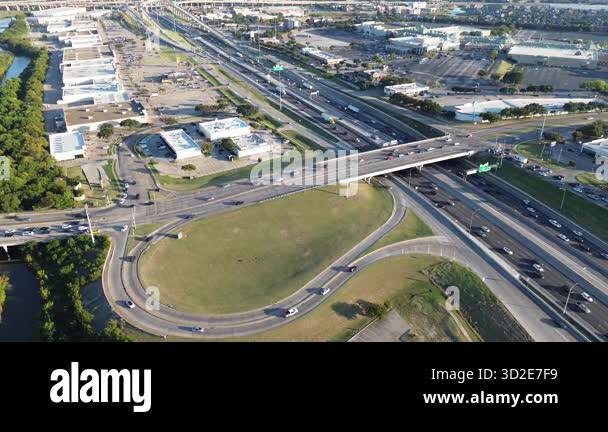 Lewisville, Texas SH 121 interchange showing elevated tollway, looping ...