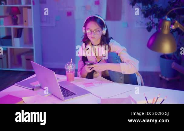 Gen Z Lifestyle, Digital Multitasking, Neon Mood. Teen Girl Draws While ...
