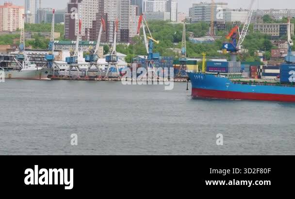 ALMATY, KAZAKHSTAN - OCTOBER 09 2025: Ship sails across water near ...