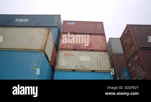 ALMATY, KAZAKHSTAN - OCTOBER 09 2025: Tall container stacks rise under ...