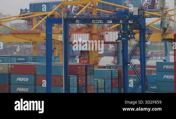 ALMATY, KAZAKHSTAN - OCTOBER 09 2025: Terminal filled with cranes and ...