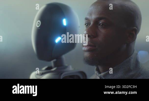 Close Up African American Engineer Next to Glowing AI Robot in Moody ...