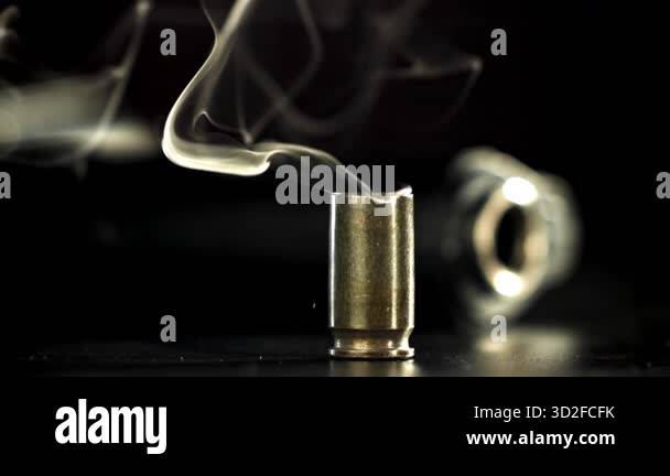 Smoke from the cartridge case after the shot. Filmed on a high-speed ...
