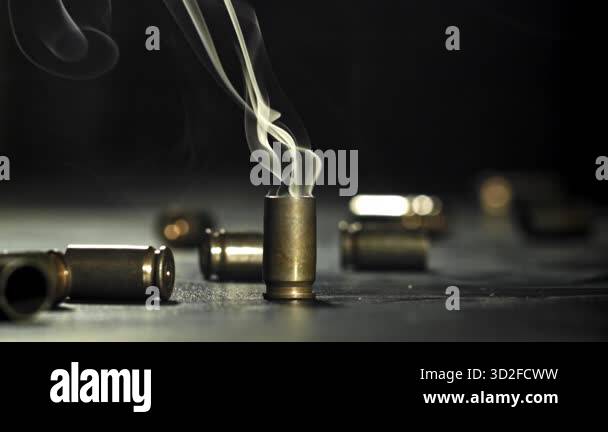 Smoke from the cartridge case after the shot. Filmed on a high-speed ...