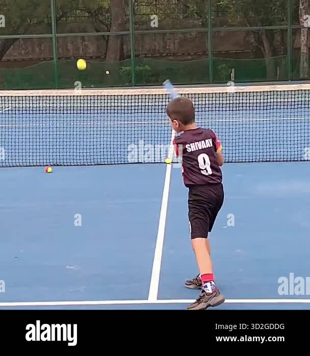 Delhi, India, February 17, 2025 - Junior tennis players having coaching ...