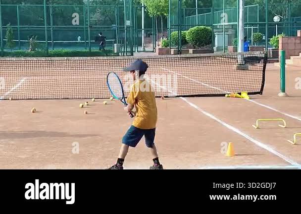 Delhi, India, February 17, 2025 - Junior tennis players having coaching ...