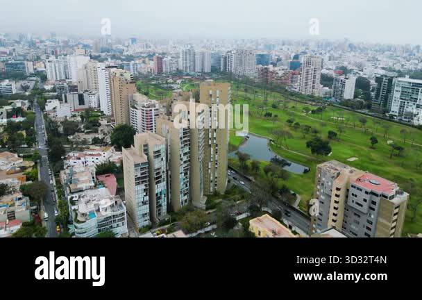 Aerial drone footage of the luxurious Lima Golf Club in San Isidro on a ...